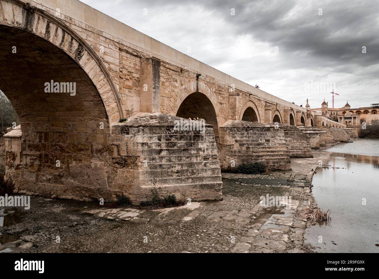 The Roman Bridge or El Puente Romano and the Calahorra Tower over the ...