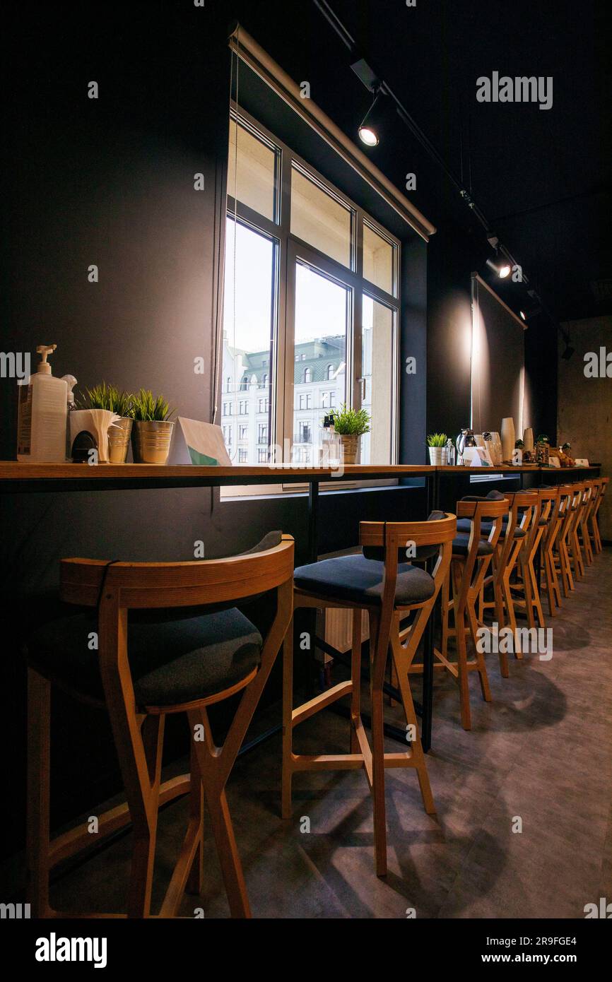 vertical interior with chairs in the office near the windowsill with ...