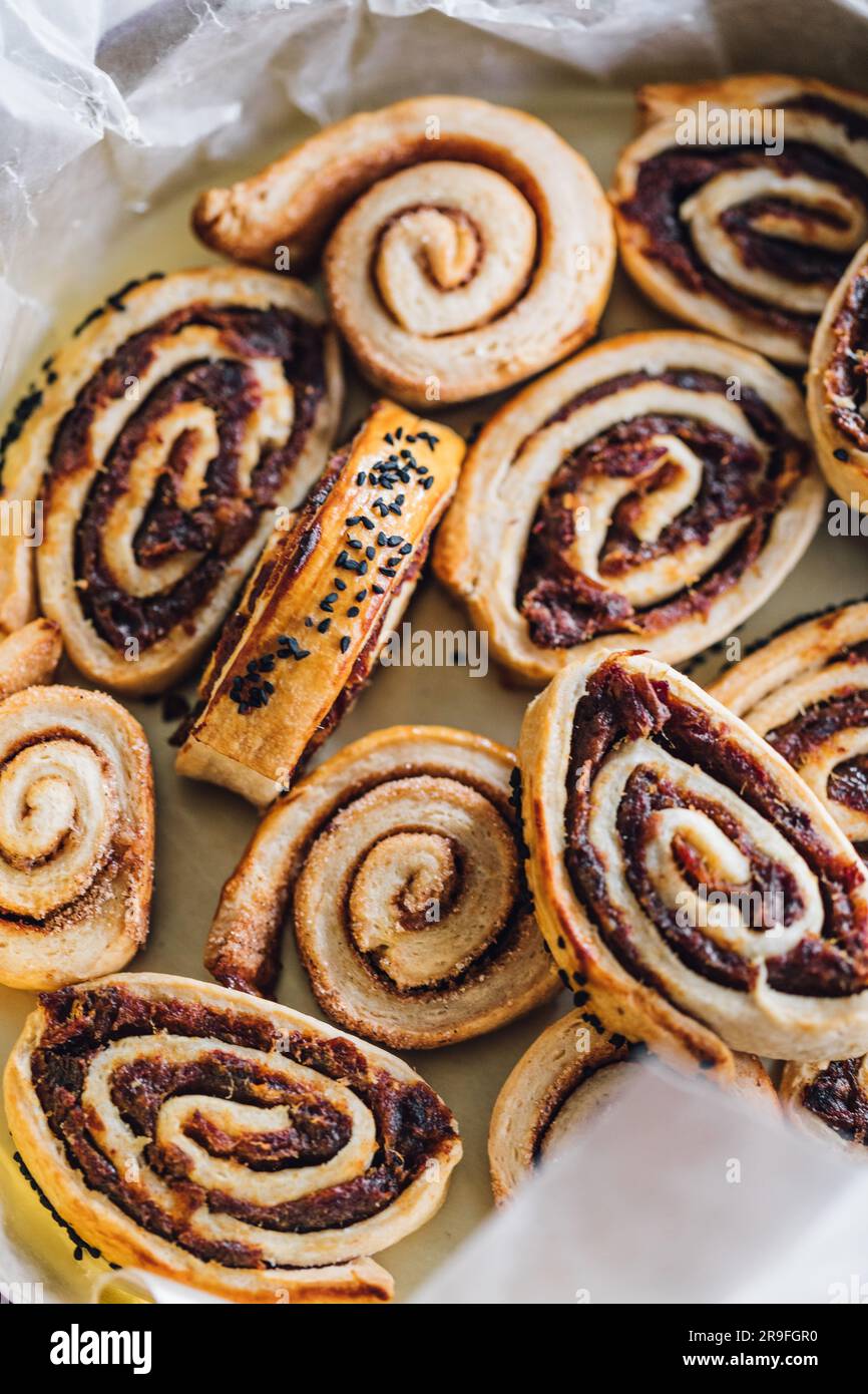 Kleicha, Iraqi date cookie in spiral form with nigella seeds Stock ...