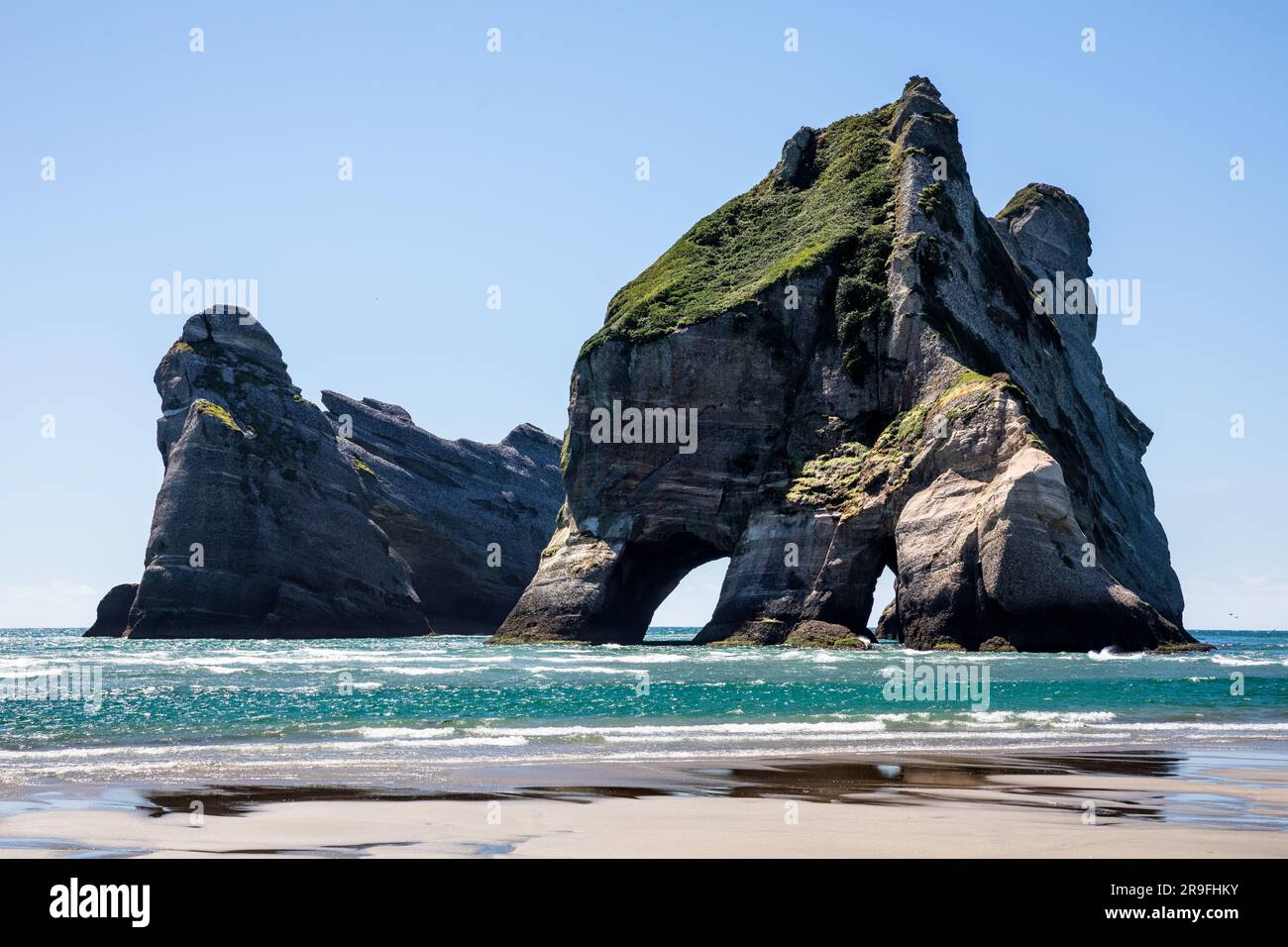 Archway Islands at Wharariki Beach, New Zealand, South Island's Most ...