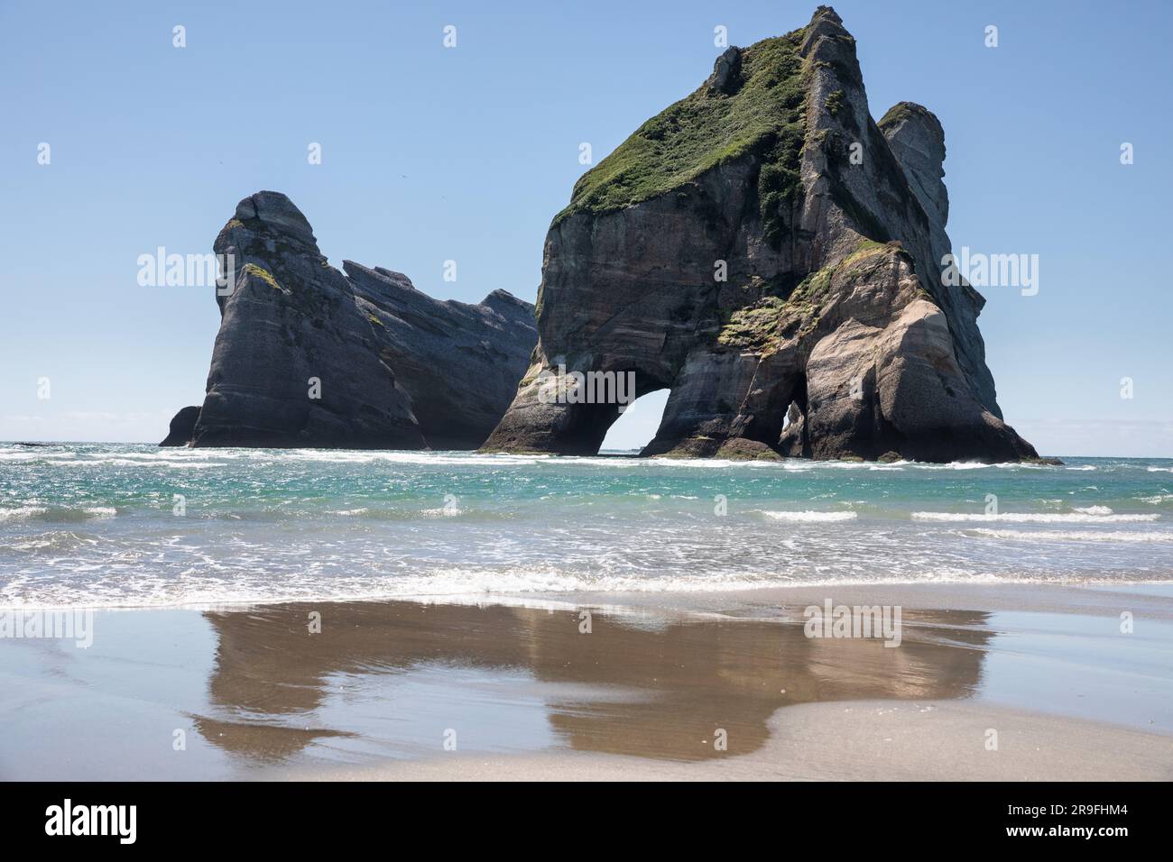 Archway Islands at Wharariki Beach, New Zealand, South Island's Most ...