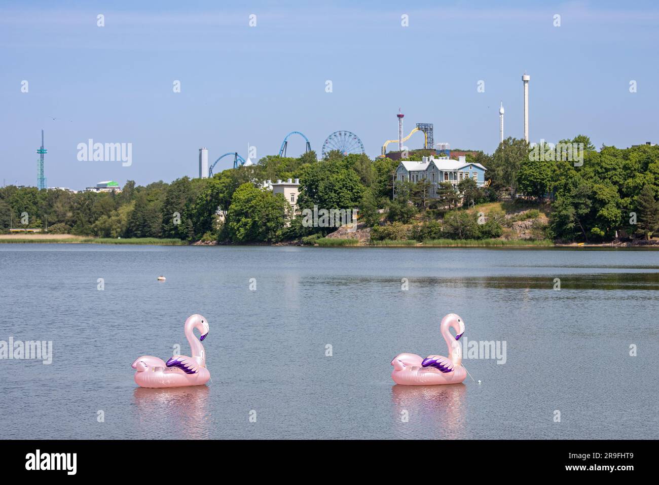 Inflatable ride-on pool toys floating at Töölönlahti Bay in Helsinki ...