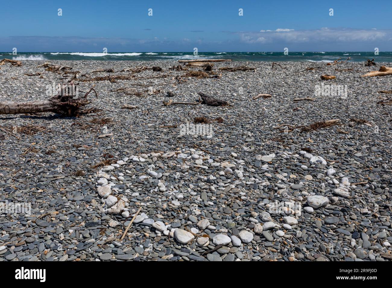 A heart of stones on windswept Ship Creek Beach on the West Coast of ...