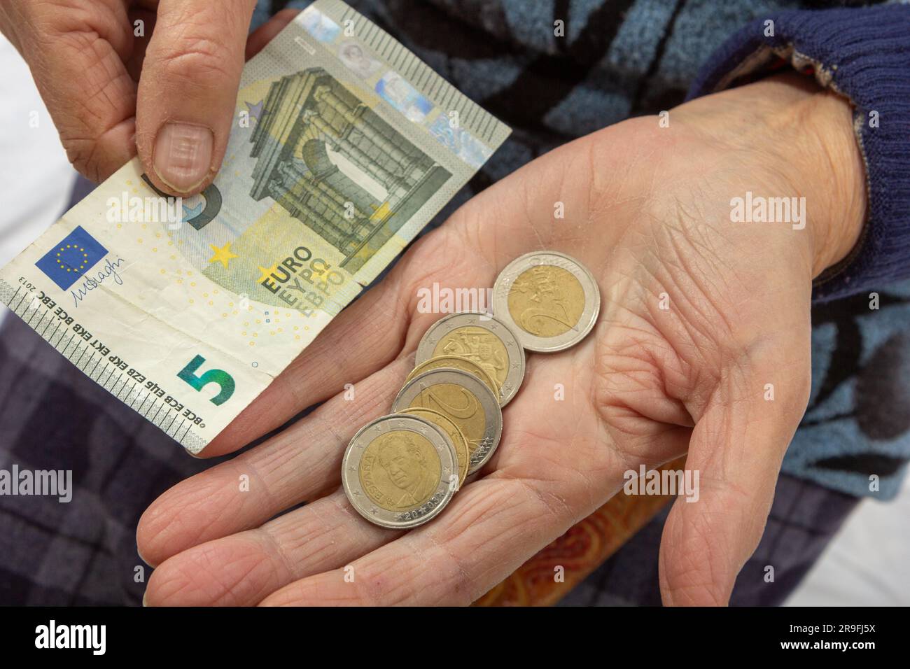 Woman money calculate euro hi-res stock photography and images - Alamy