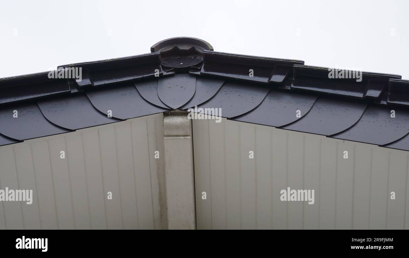 A close-up view of a roof vent with water gushing through it Stock ...