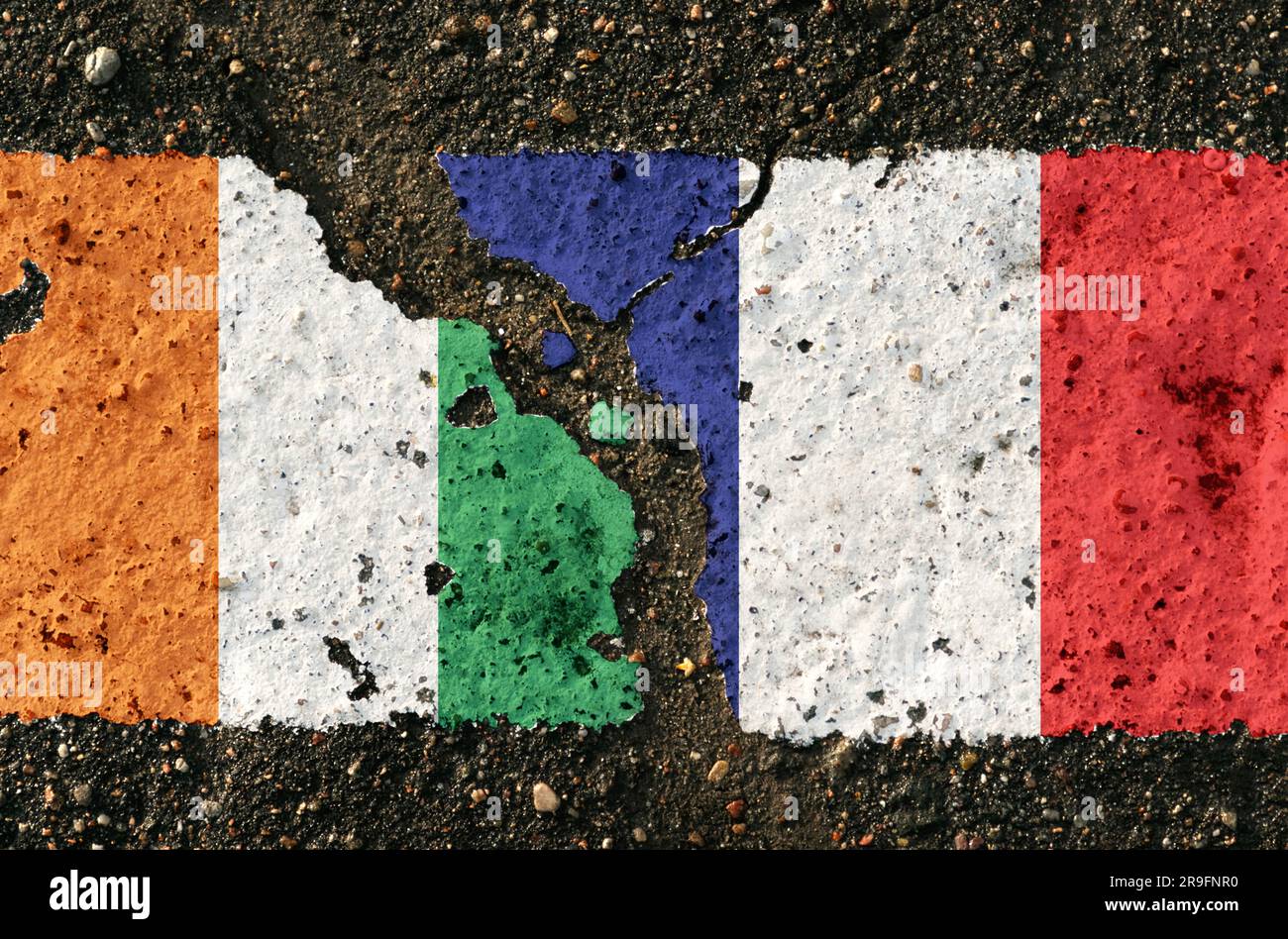 On the pavement are images of the flags of IVORY COAST and France, as a ...