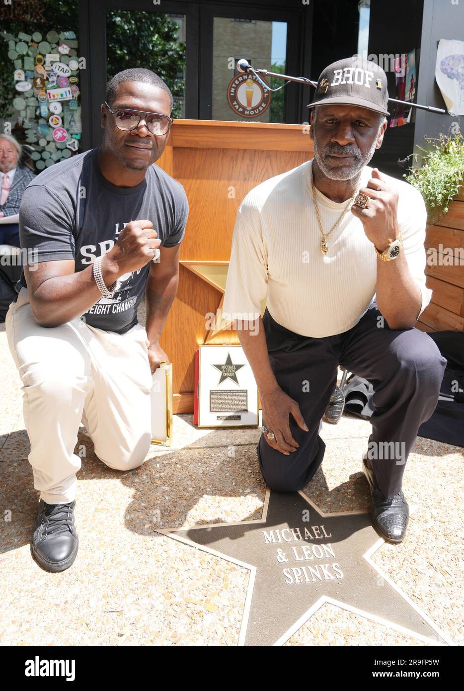 Boxers Corey Spinks (L) representing his late father Leon and Michael ...