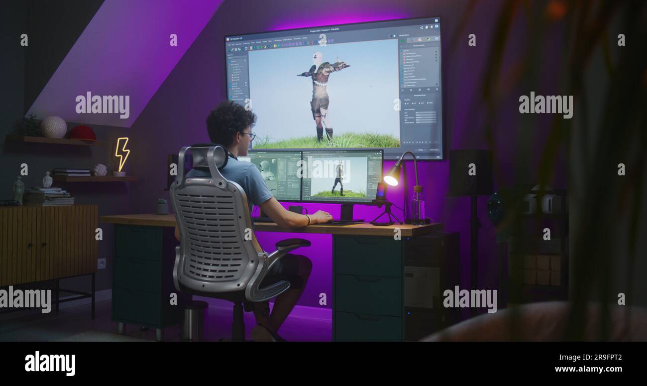 Young 3D designer creates animation for video game character, works ...