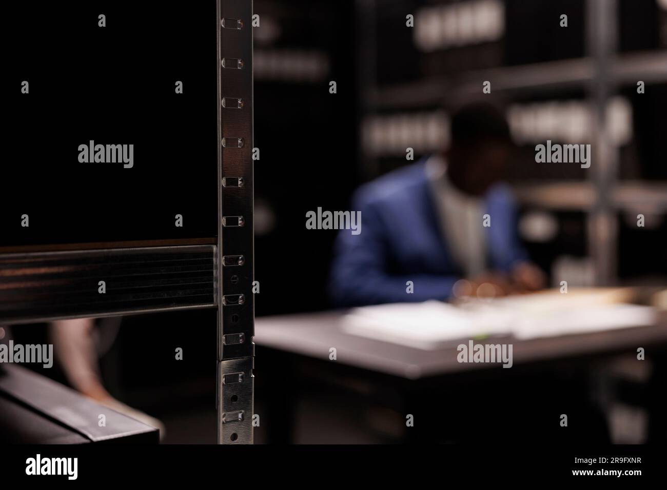 Selective focus of shelves full with police documents, in background ...