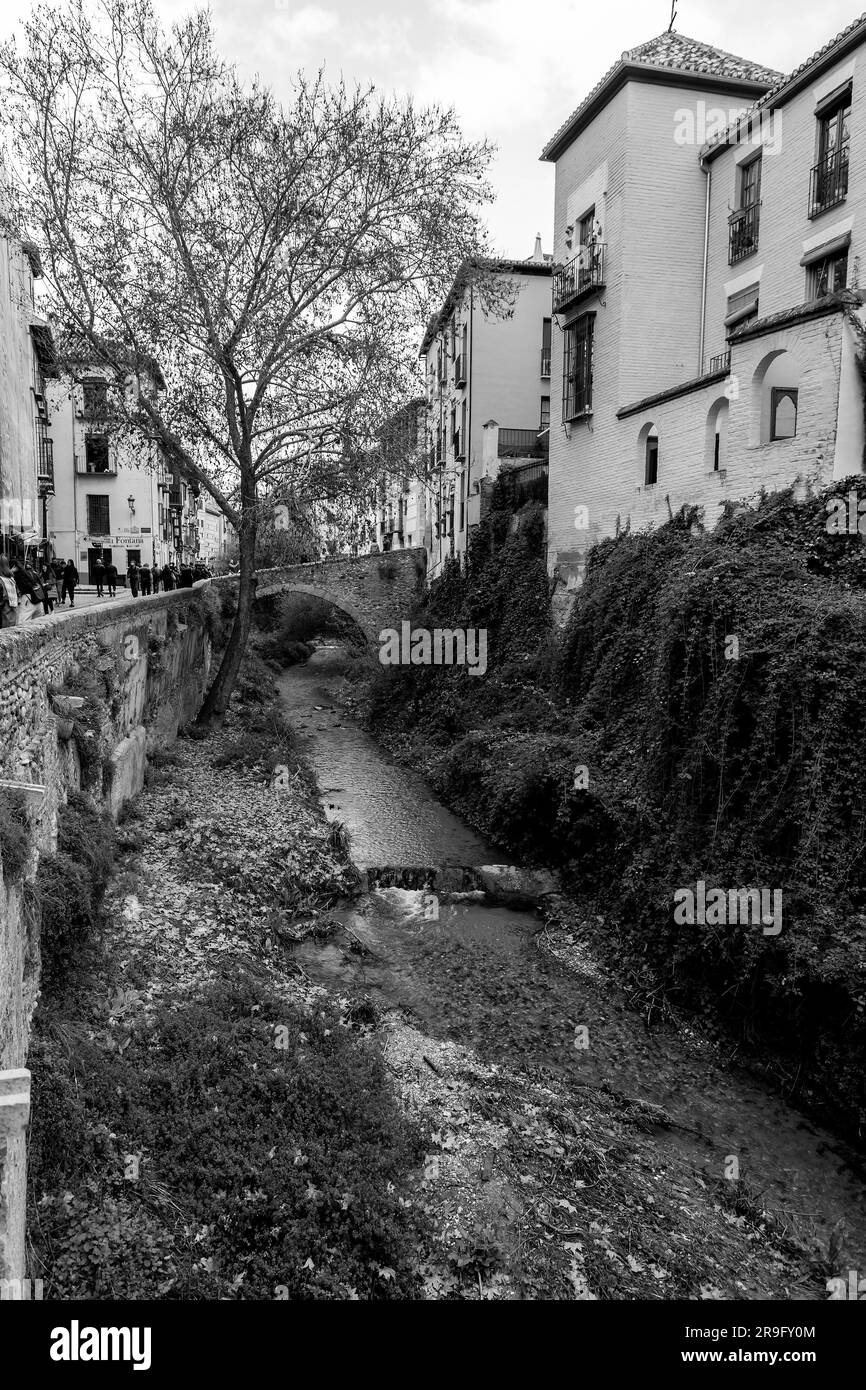 Granada, Spain-Feb 26, 2022: The stone bridge and traditional moorish ...