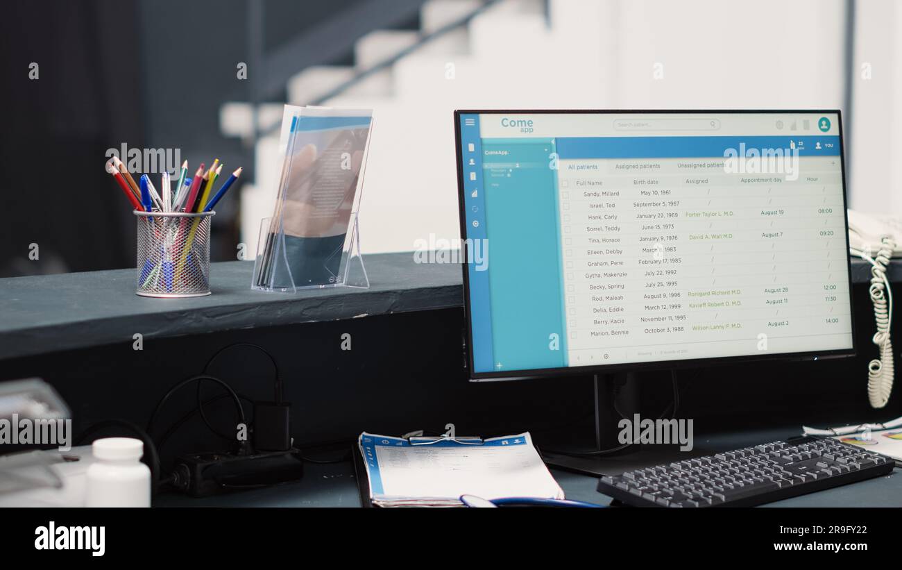Empty counter with appointments forms on computer, health center ...