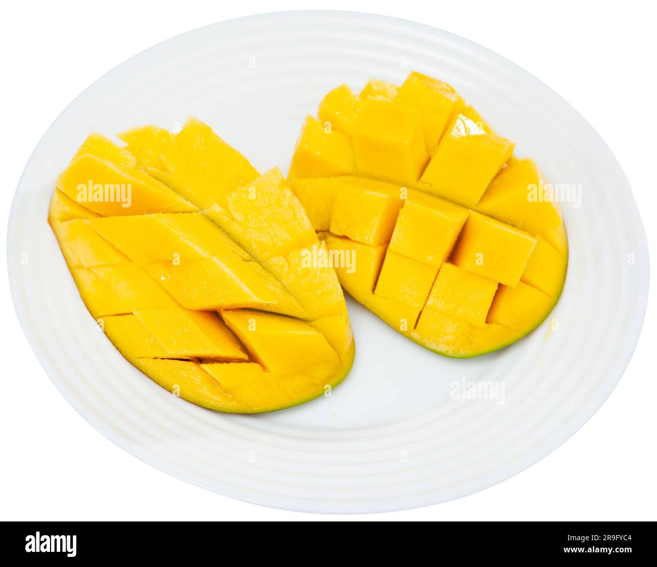 Pieces of ripe mango served on platter Stock Photo - Alamy