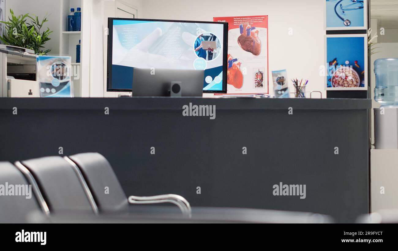 Hospital reception lobby with forms on front desk, papers used for ...