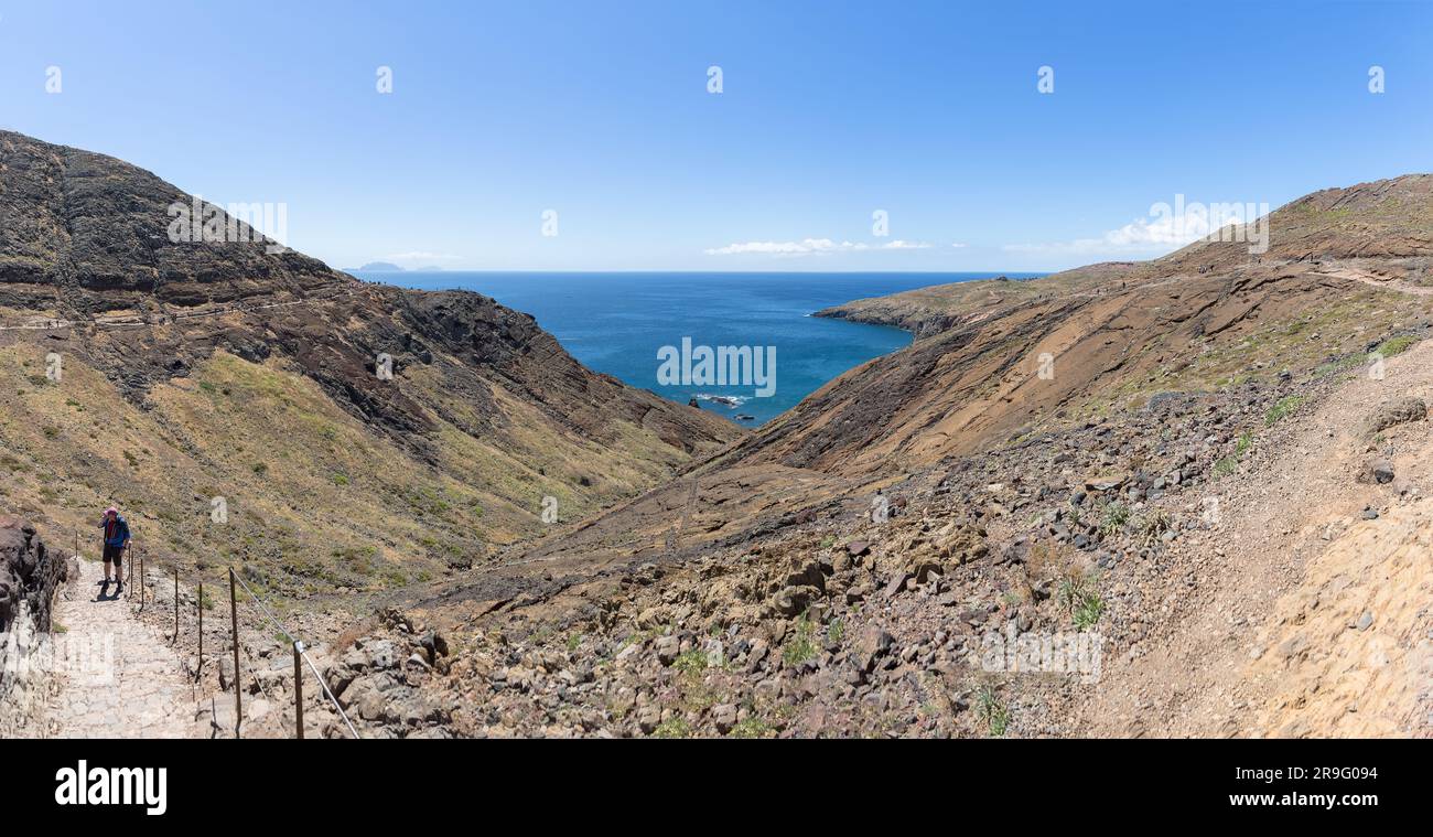 Madeira Island Portugal - 04 19 2023: View of a tourist man hiking in ...
