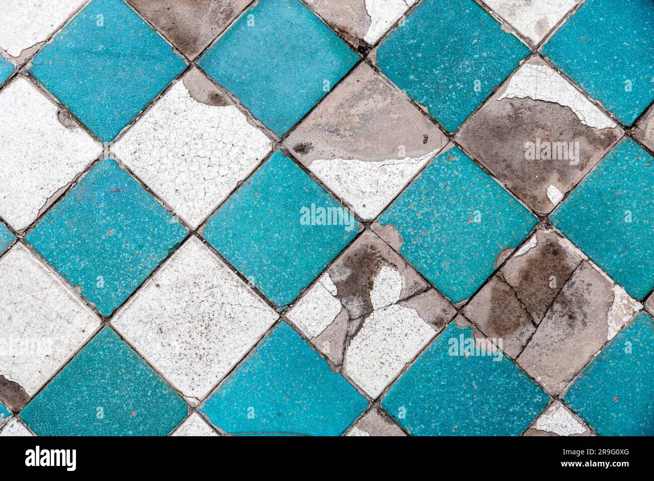 Fragment of Andalusian glazed ceramic tiled wall close up texture ...