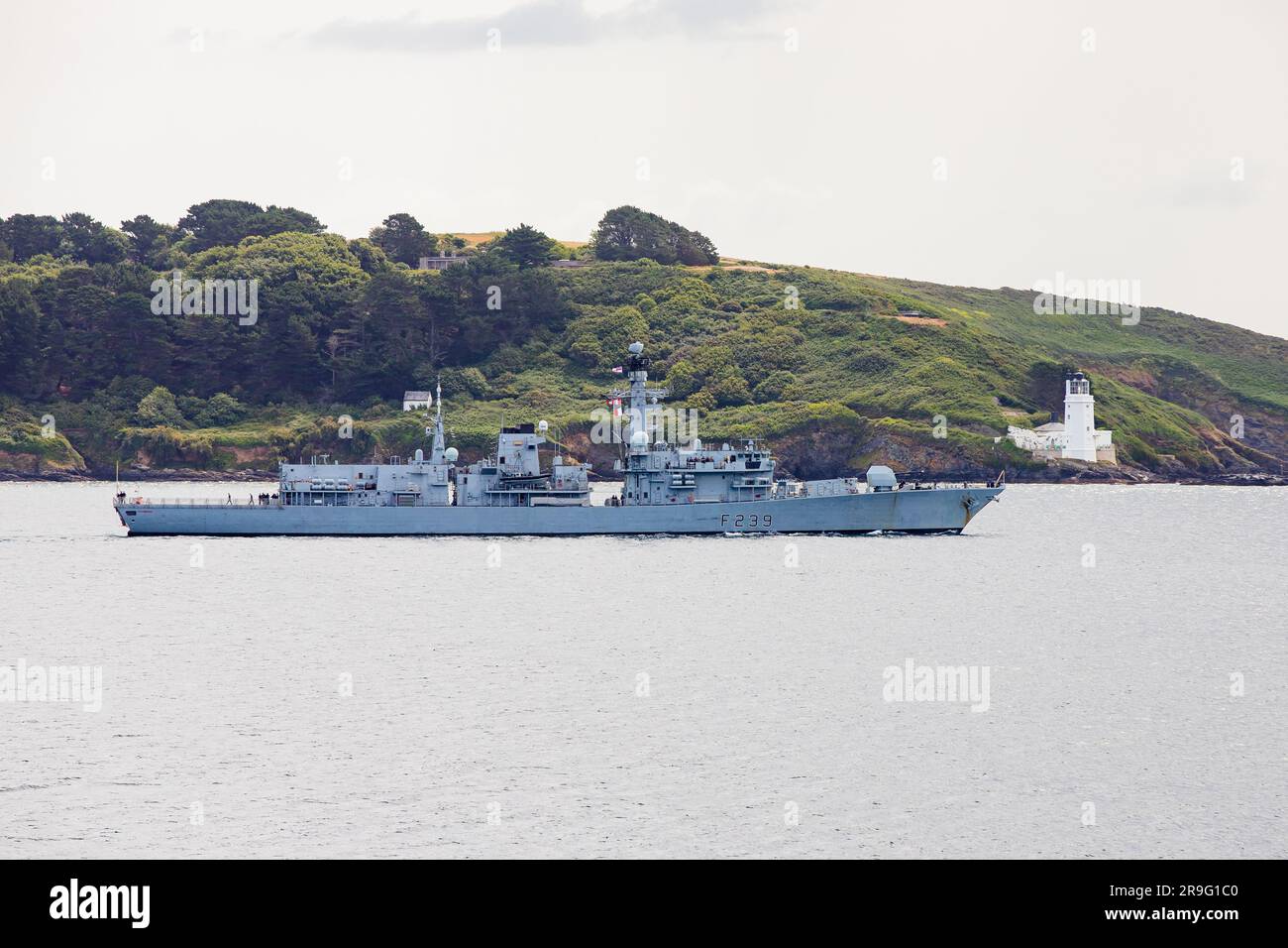 Royal Navy Type 23 frigate HMS Richmond passing St Anthony's Lighthouse ...