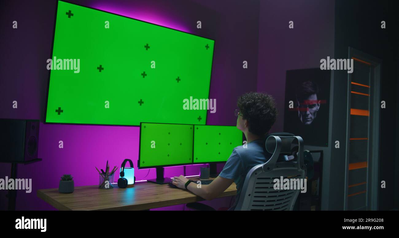 Young editor, 3D designer works remotely at home studio, edits movie ... Young editor, 3D designer works remotely at home studio, edits movie ...