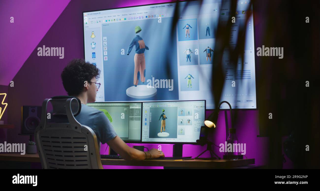 Young 3D designer creates video game character or clothes, works ...