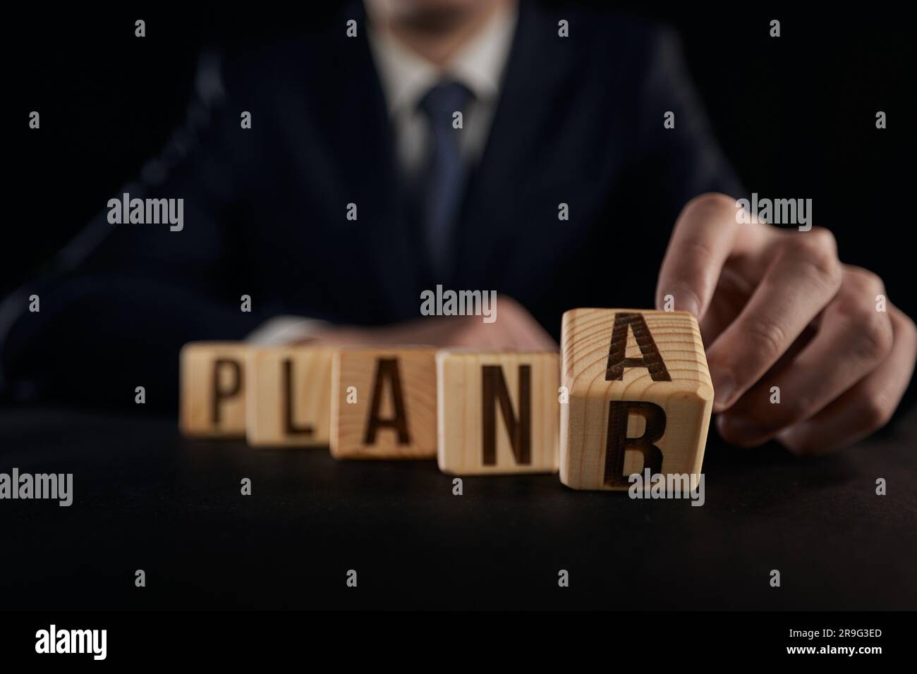 the hand highlights the letter A from the plan Stock Photo - Alamy