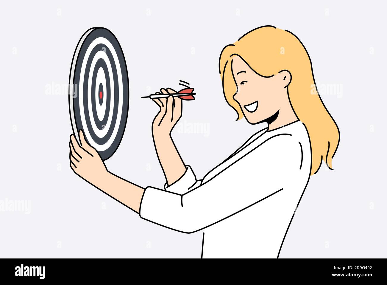 Determined woman throws darts at target for concept of business success ...