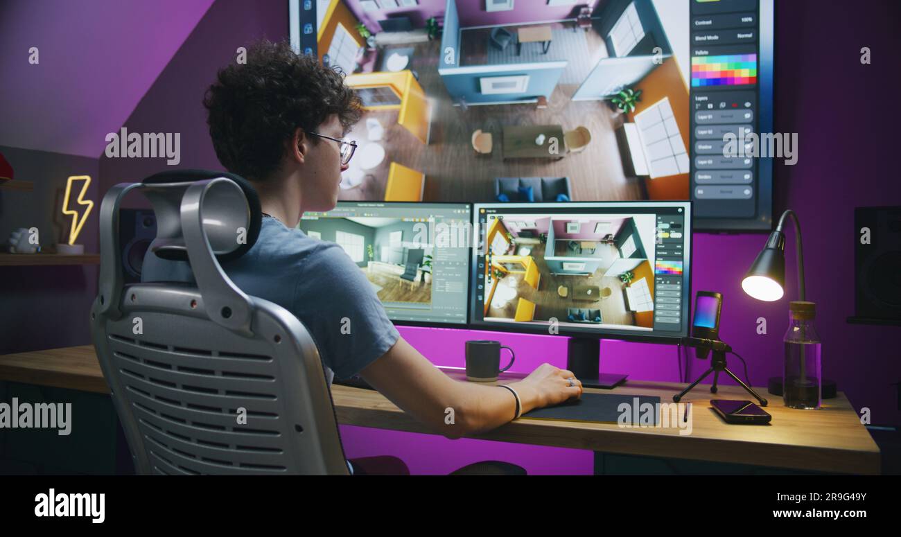 Young 3D designer creates modern house interior, works on design ...