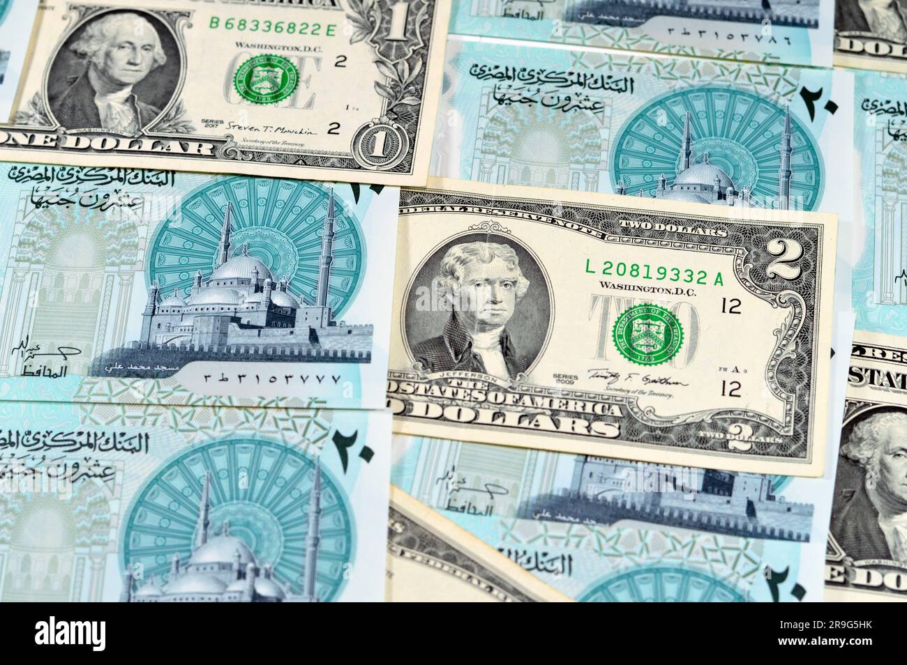 Background of USD American dollars money bills with the new Egyptian 20 ...