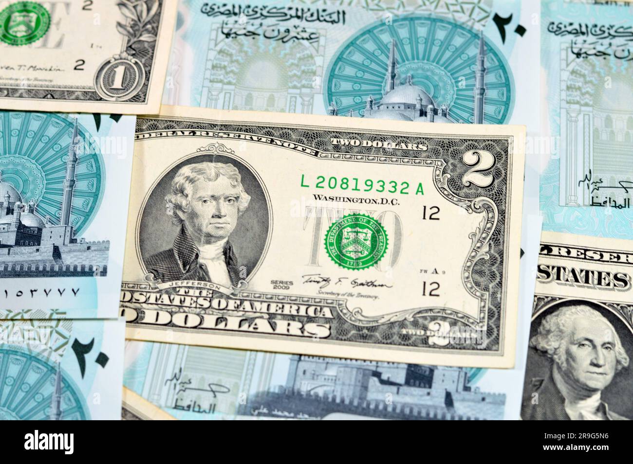 Background of USD American dollars money bills with the new Egyptian 20 ...