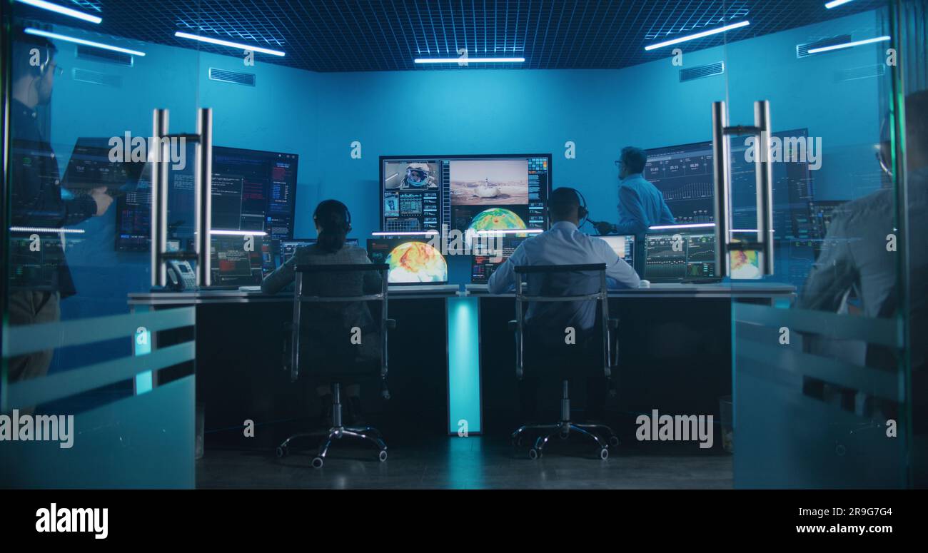 Team watch successful space rocket launch on big digital screens in ...