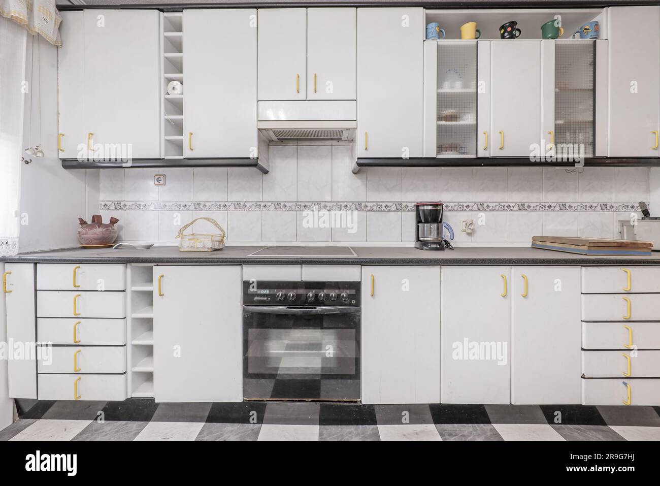 Front of an old-fashioned kitchen decorated in a controversial way with ...