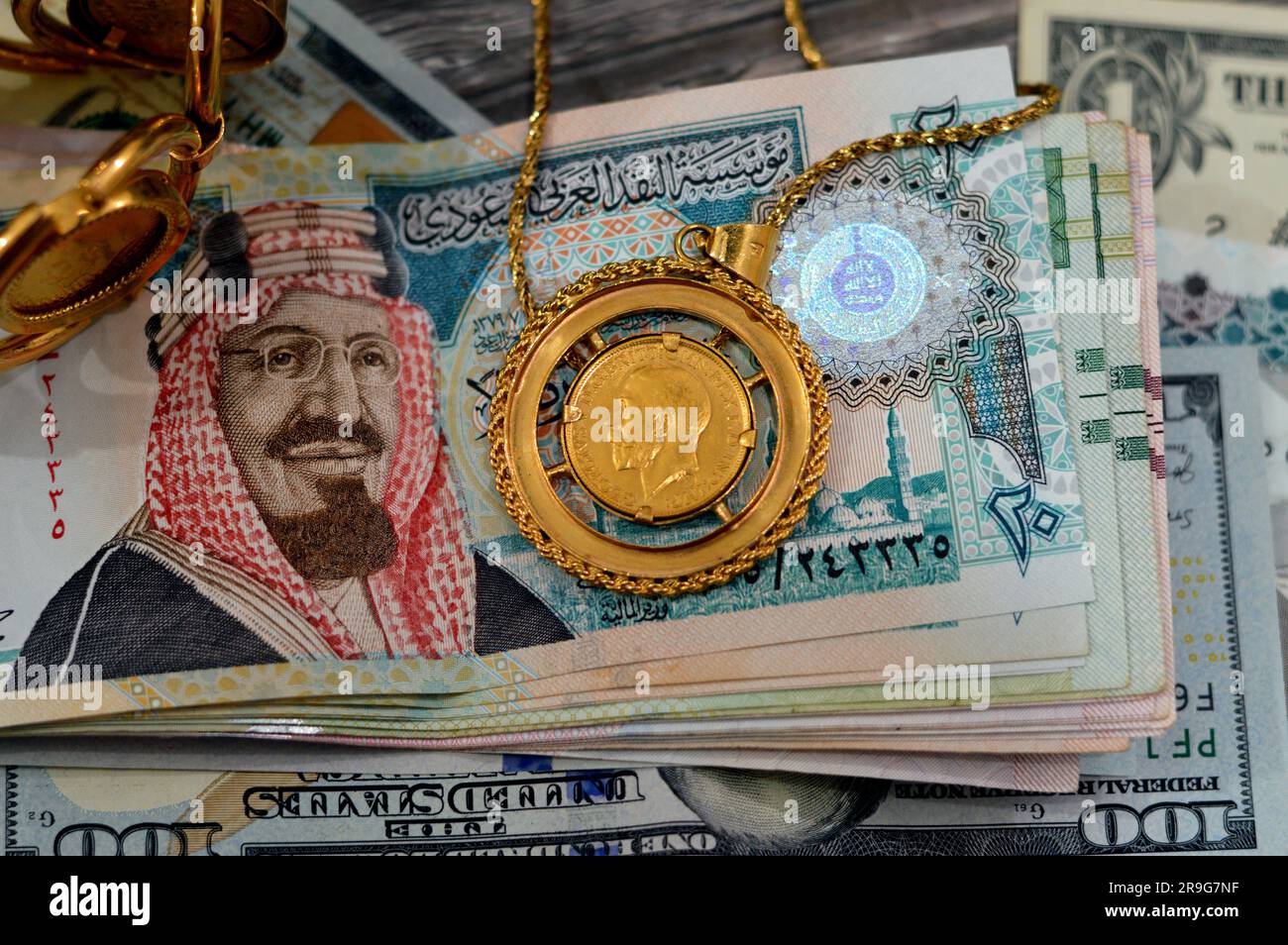 American dollars, Egyptian pounds and Saudi Arabia Riyals banknotes ...