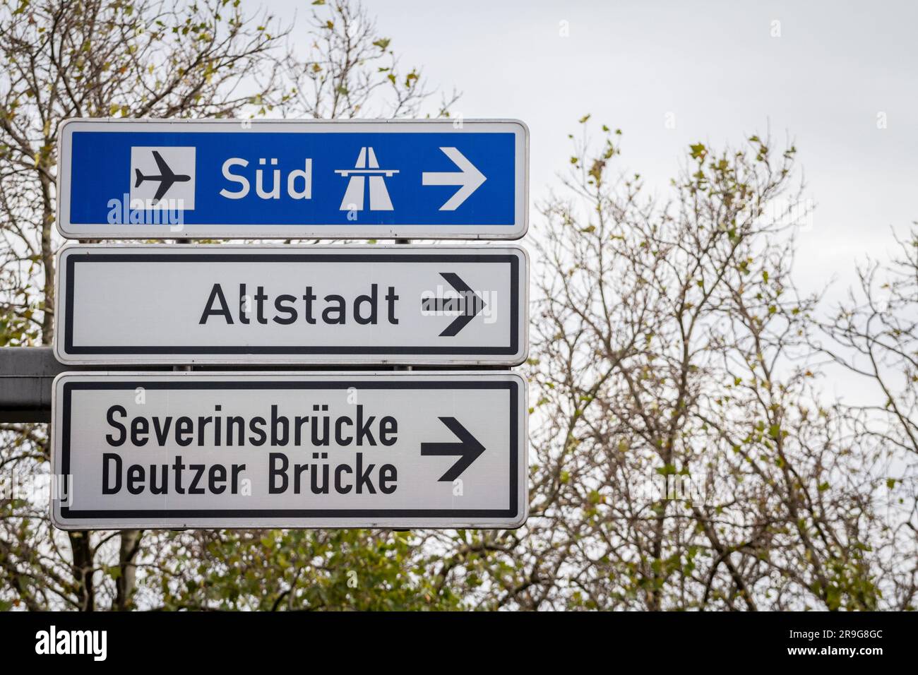 Picture of a german roadsign indicating various directions, notably the ...
