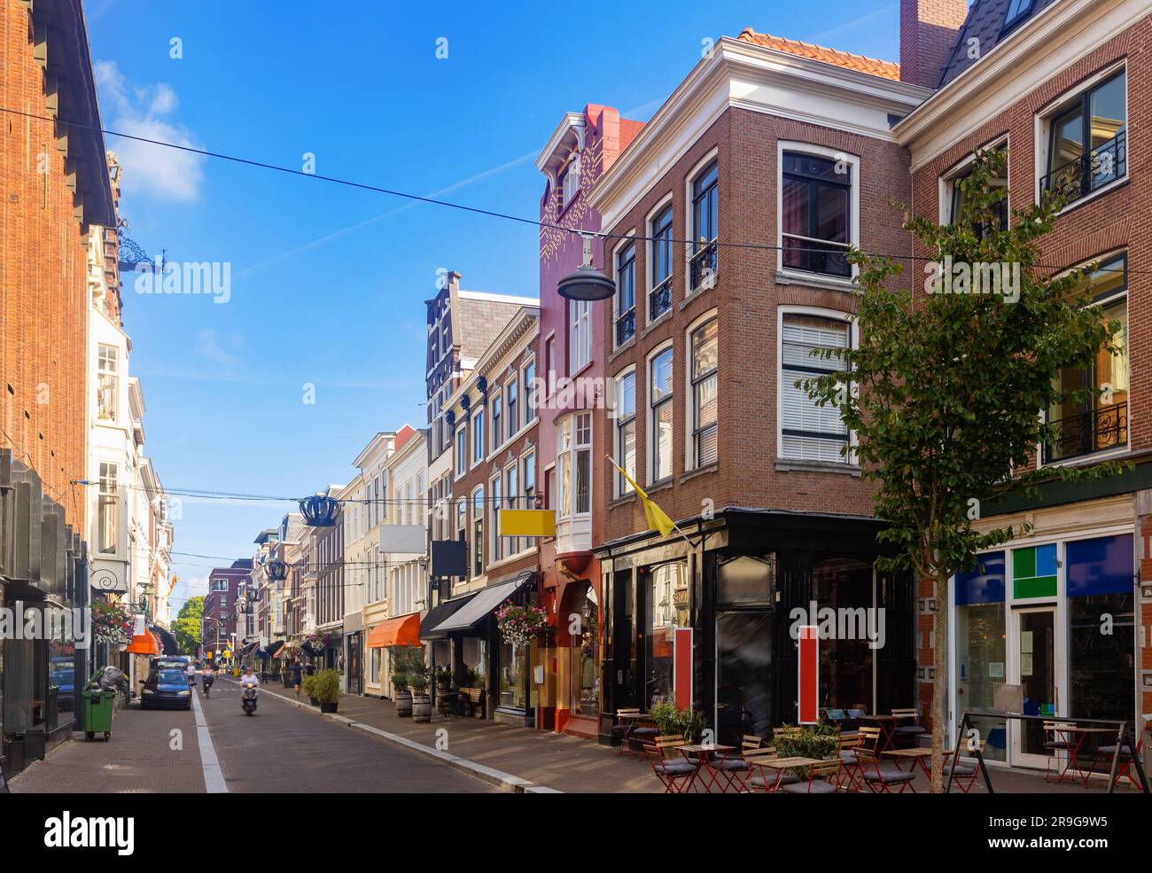 Street in Old Town The Hague with old buildings in summer Stock Photo ...