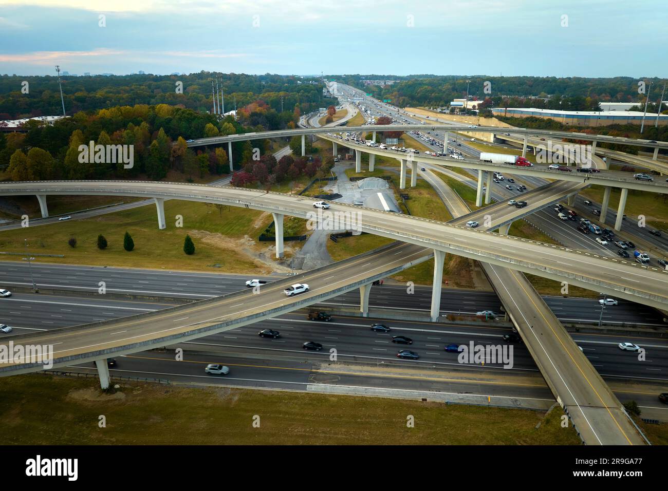 Aerial view of american freeway intersection with fast moving cars and ...