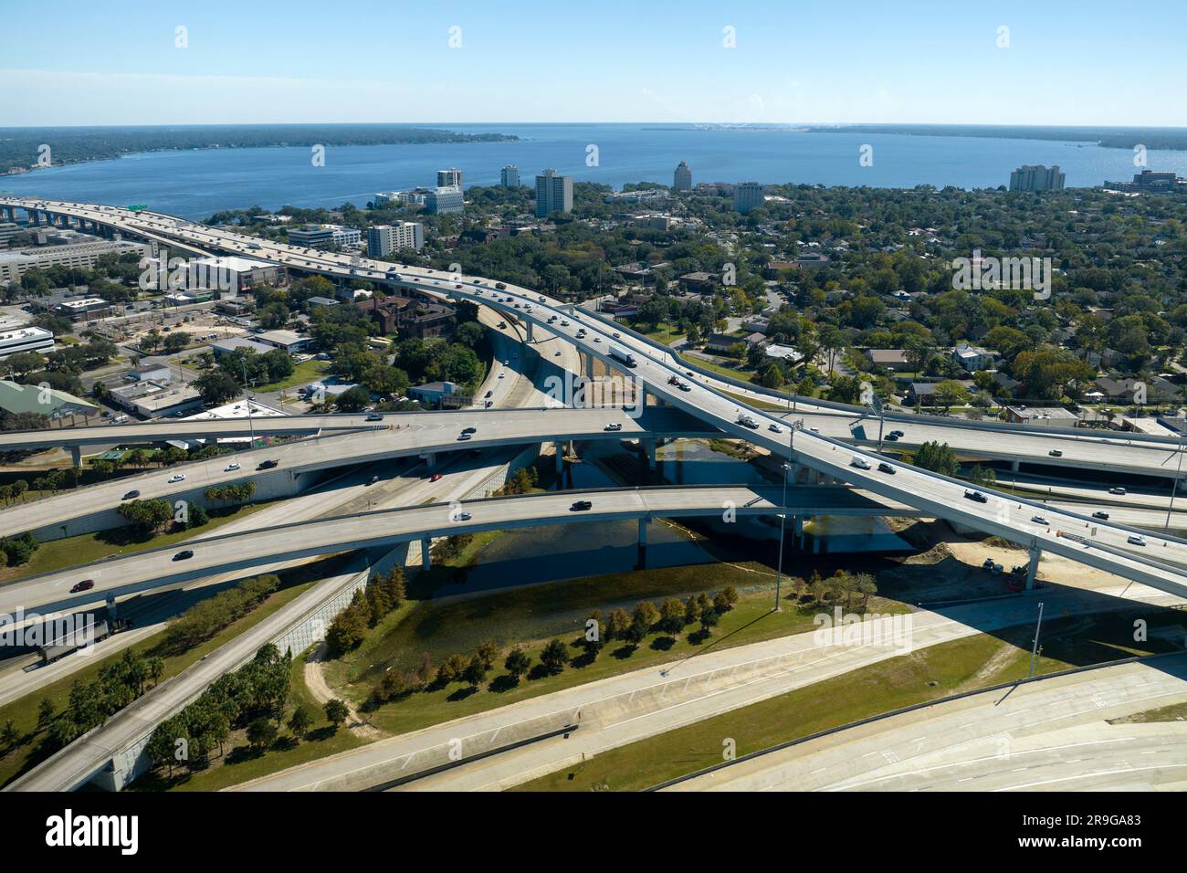Aerial view of american freeway intersection with fast moving cars and ...