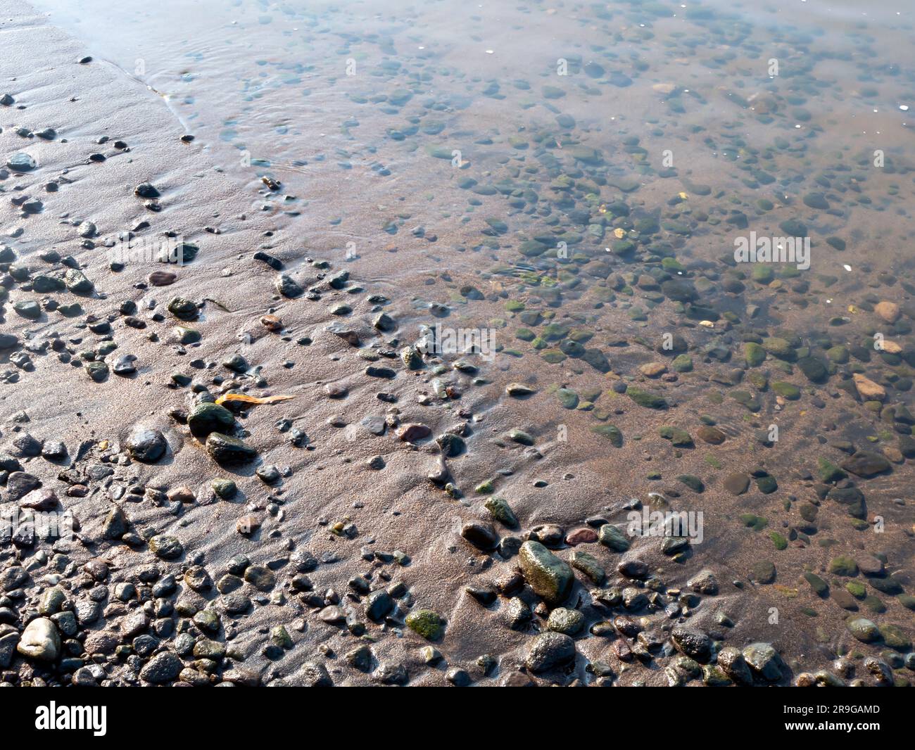 Gravels, pepples, sea stones under water on the south coast of the Java ...
