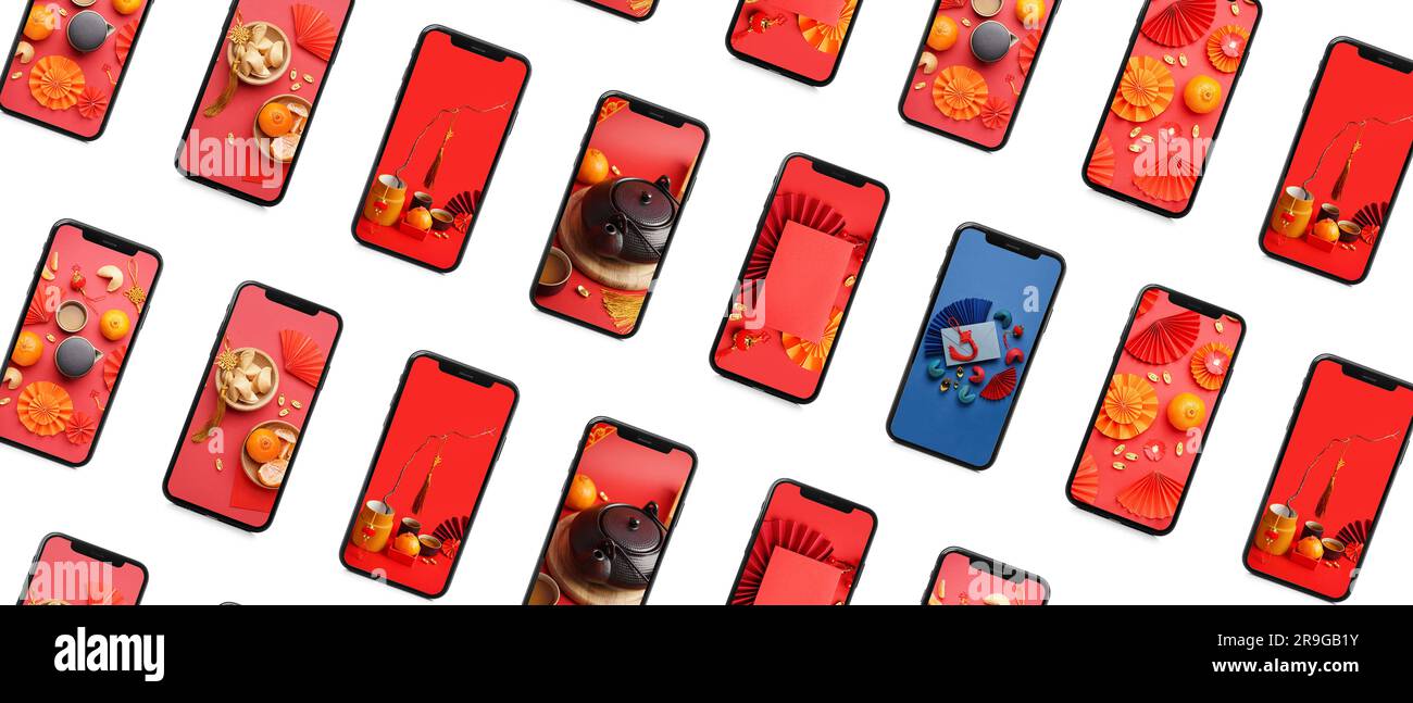 Many mobile phones with Chinese wallpapers on screens against white ...