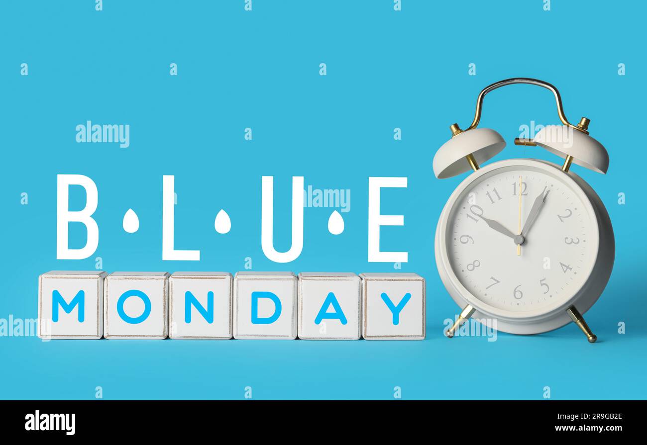 Alarm clock and text BLUE MONDAY Stock Photo - Alamy