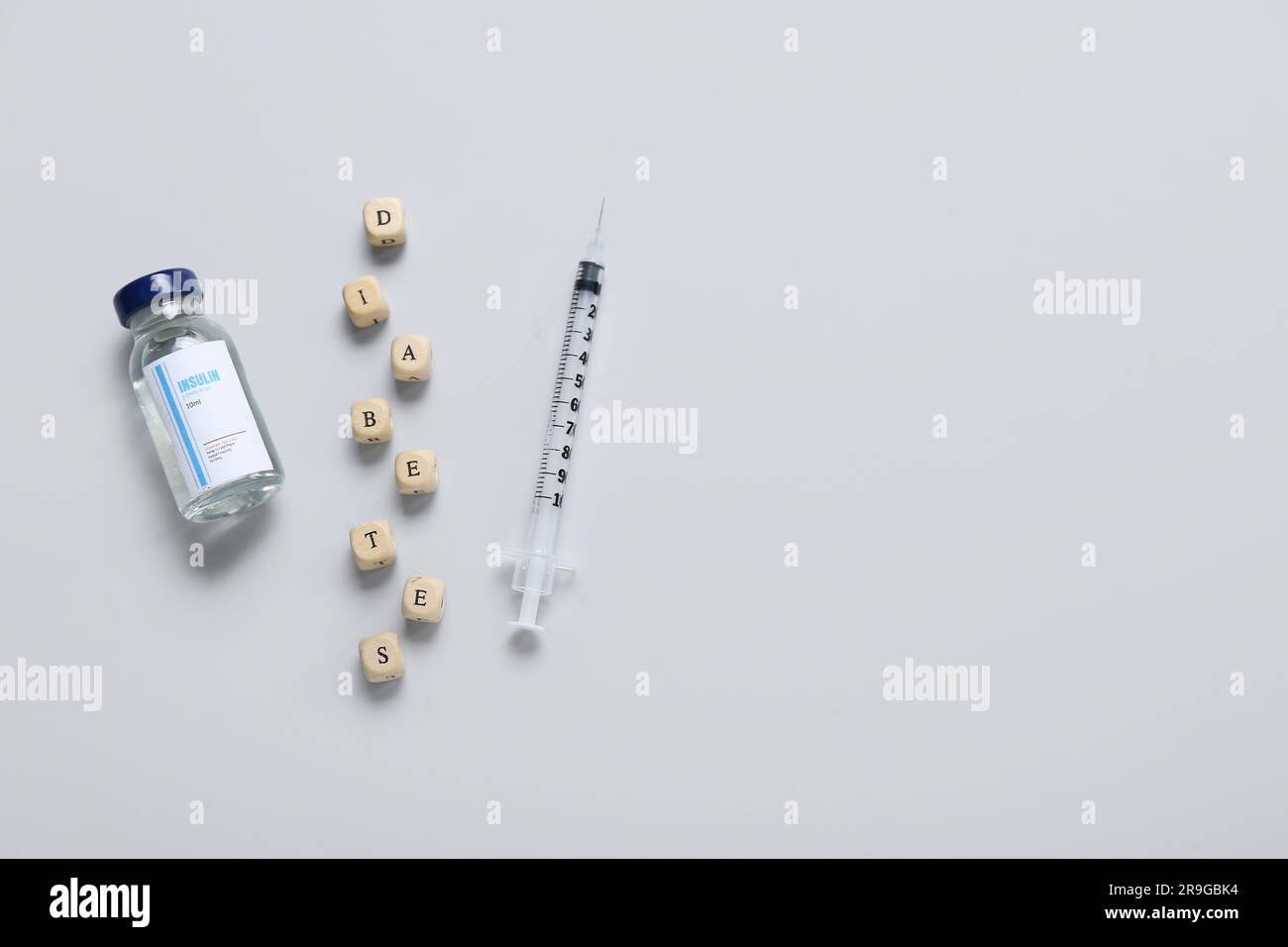 Word DIABETES with insulin and syringe on grey background Stock Photo ...