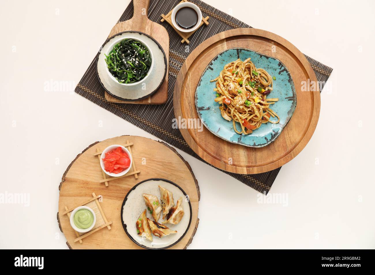 Composition with tasty Chinese food on light background Stock Photo - Alamy