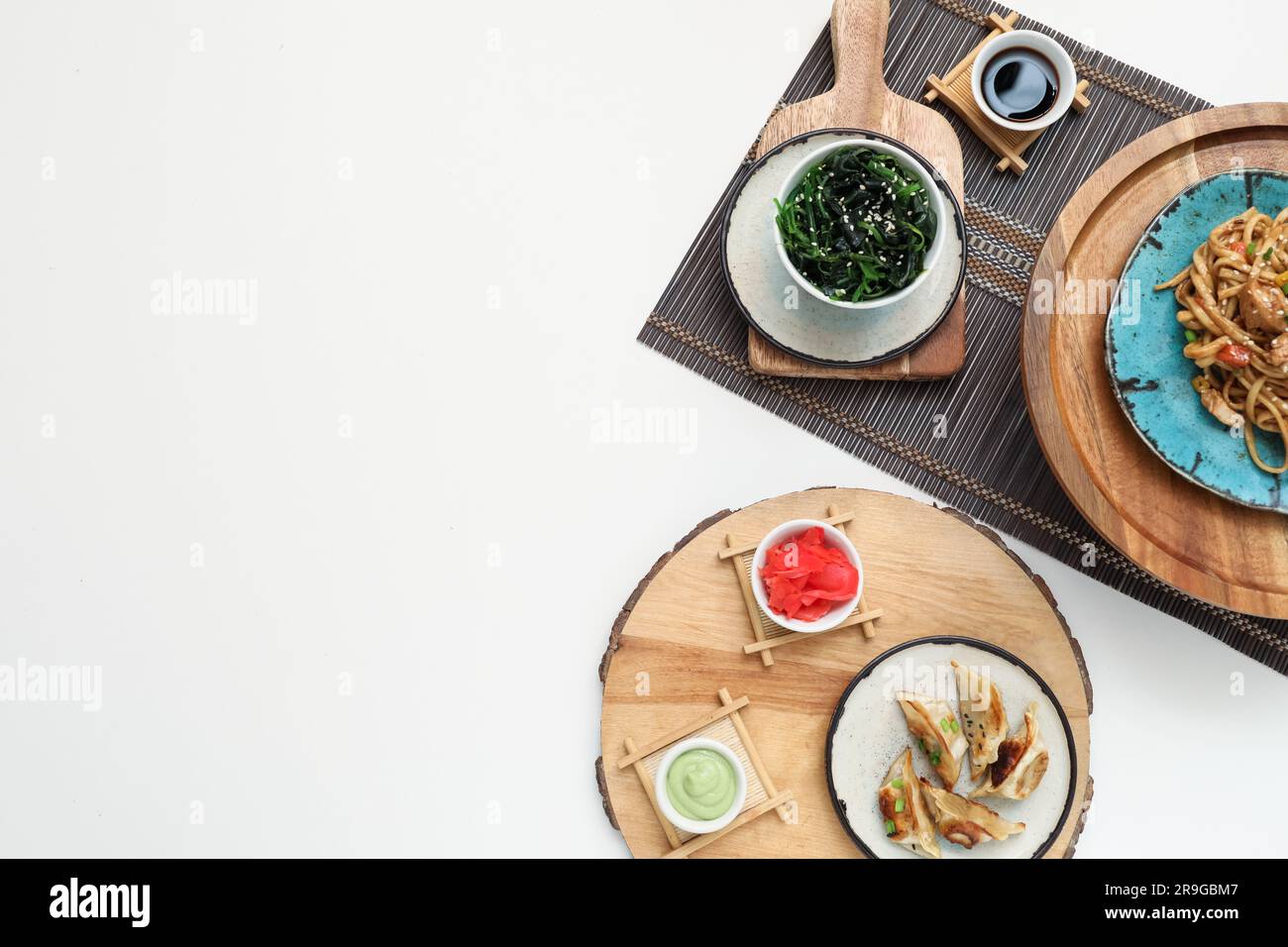 Composition with tasty Chinese food on light background Stock Photo - Alamy