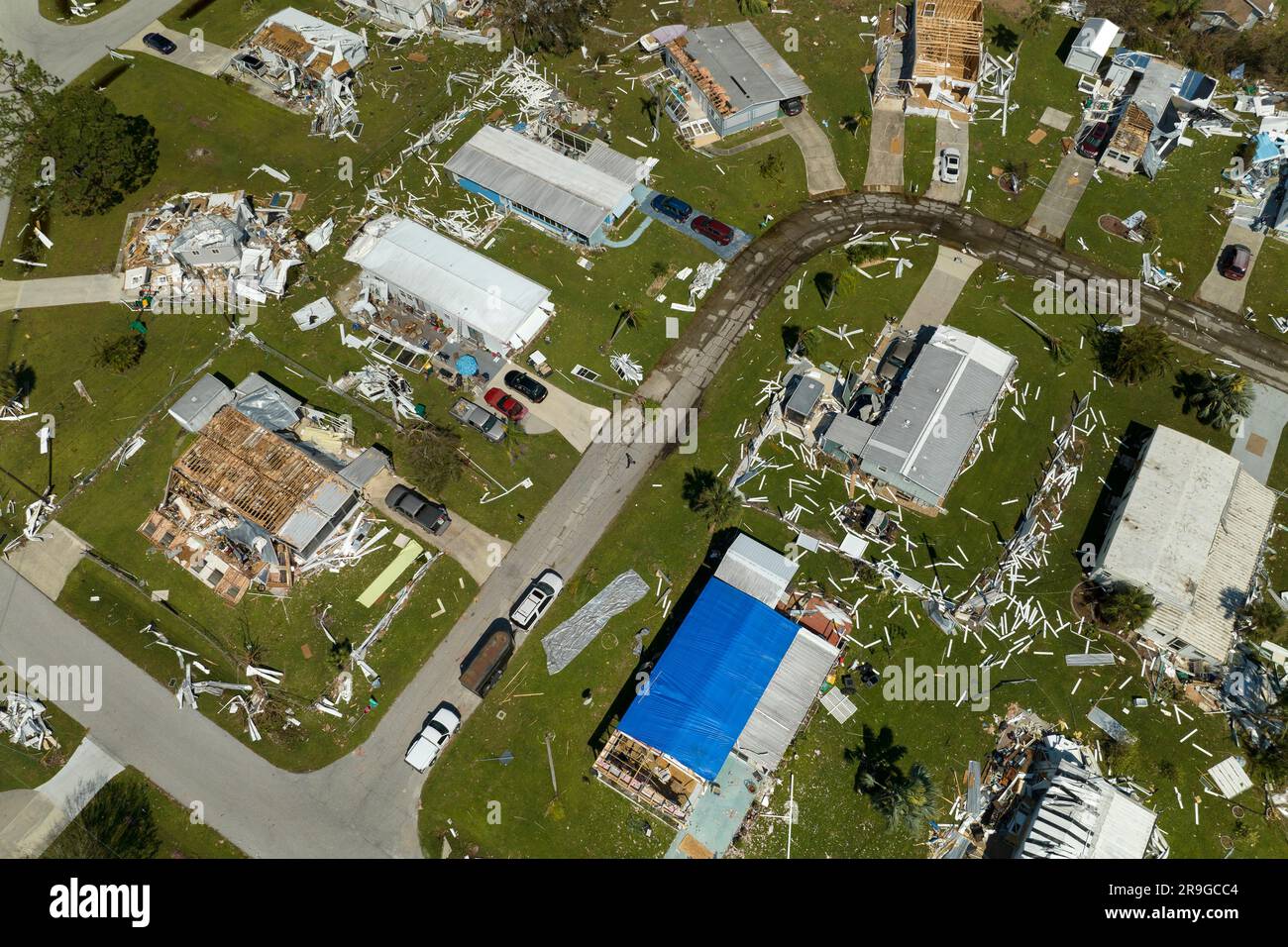 Aerial view of natural disaster consequences in Florida Southwest region. Severely damaged by ...