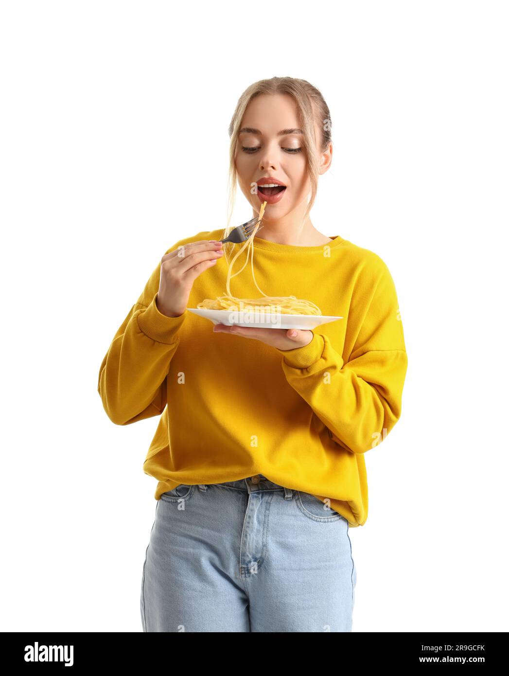 Beautiful girl eating pasta isolated hi-res stock photography and ...