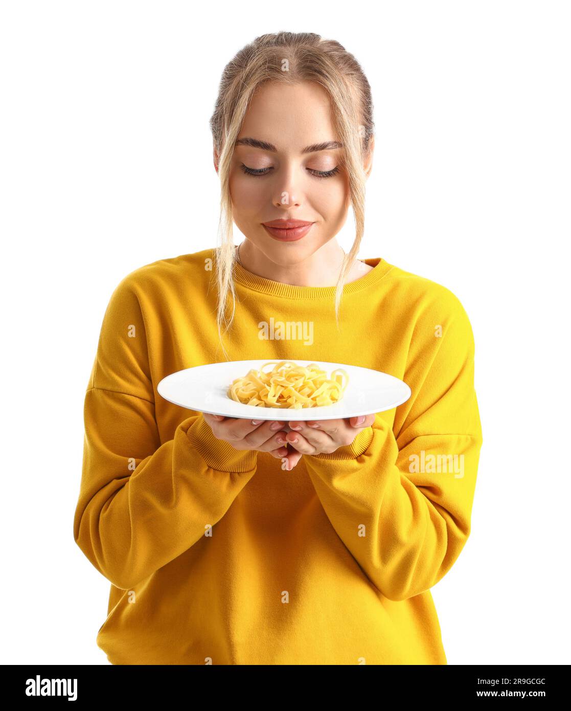 Woman smell dinner plate hi-res stock photography and images - Alamy