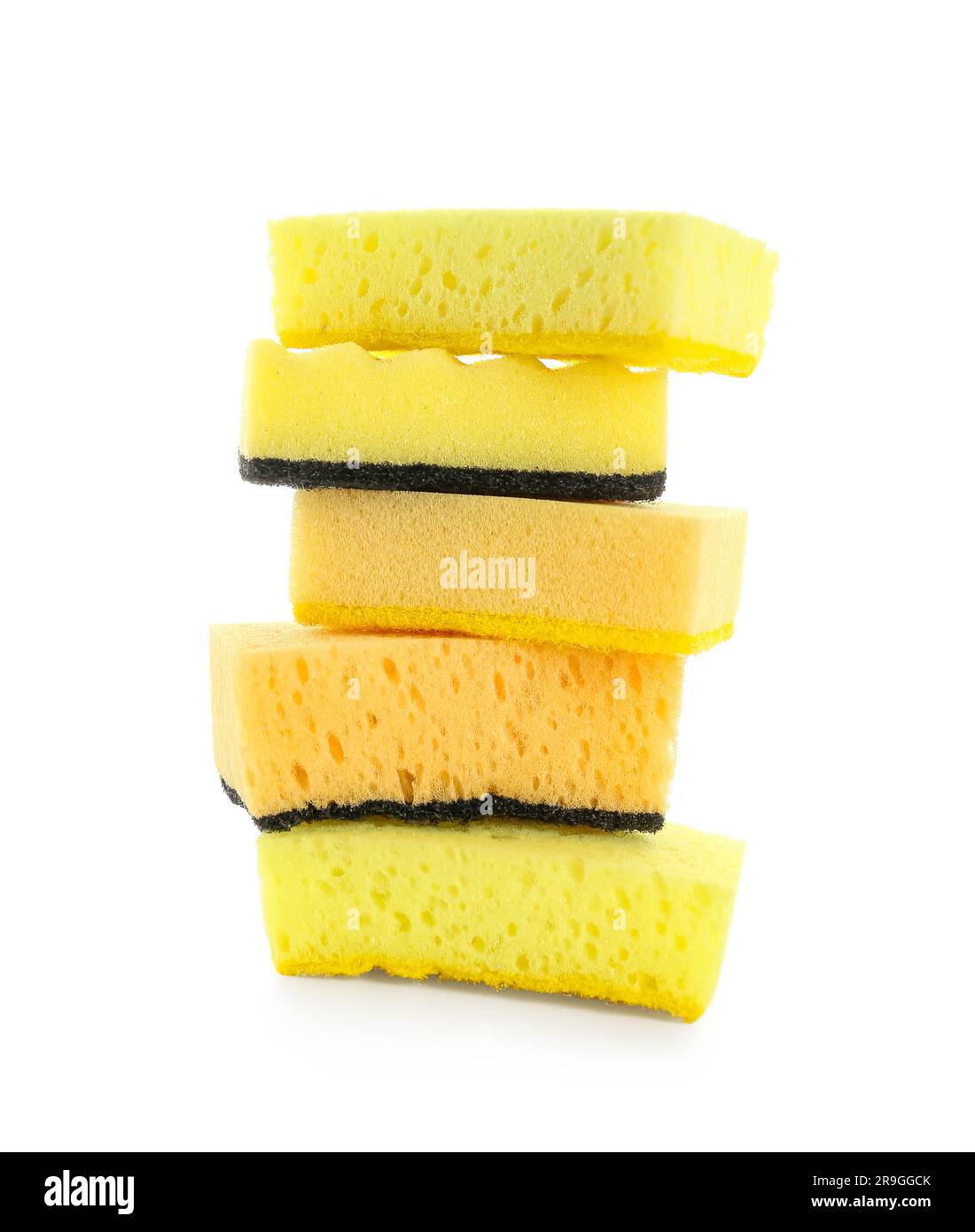 Stack of yellow sponges isolated on white background Stock Photo - Alamy