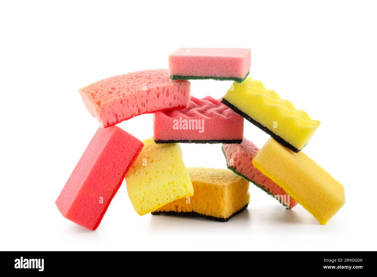 Pile of sponges isolated on white background Stock Photo - Alamy