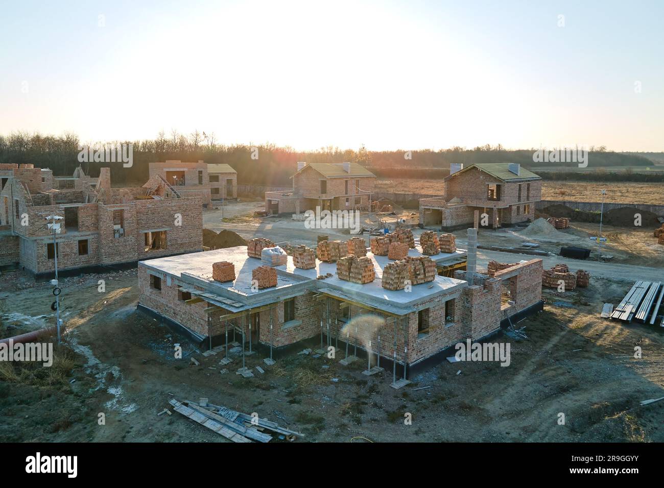 Industrial building site in rural area with residential houses under ...