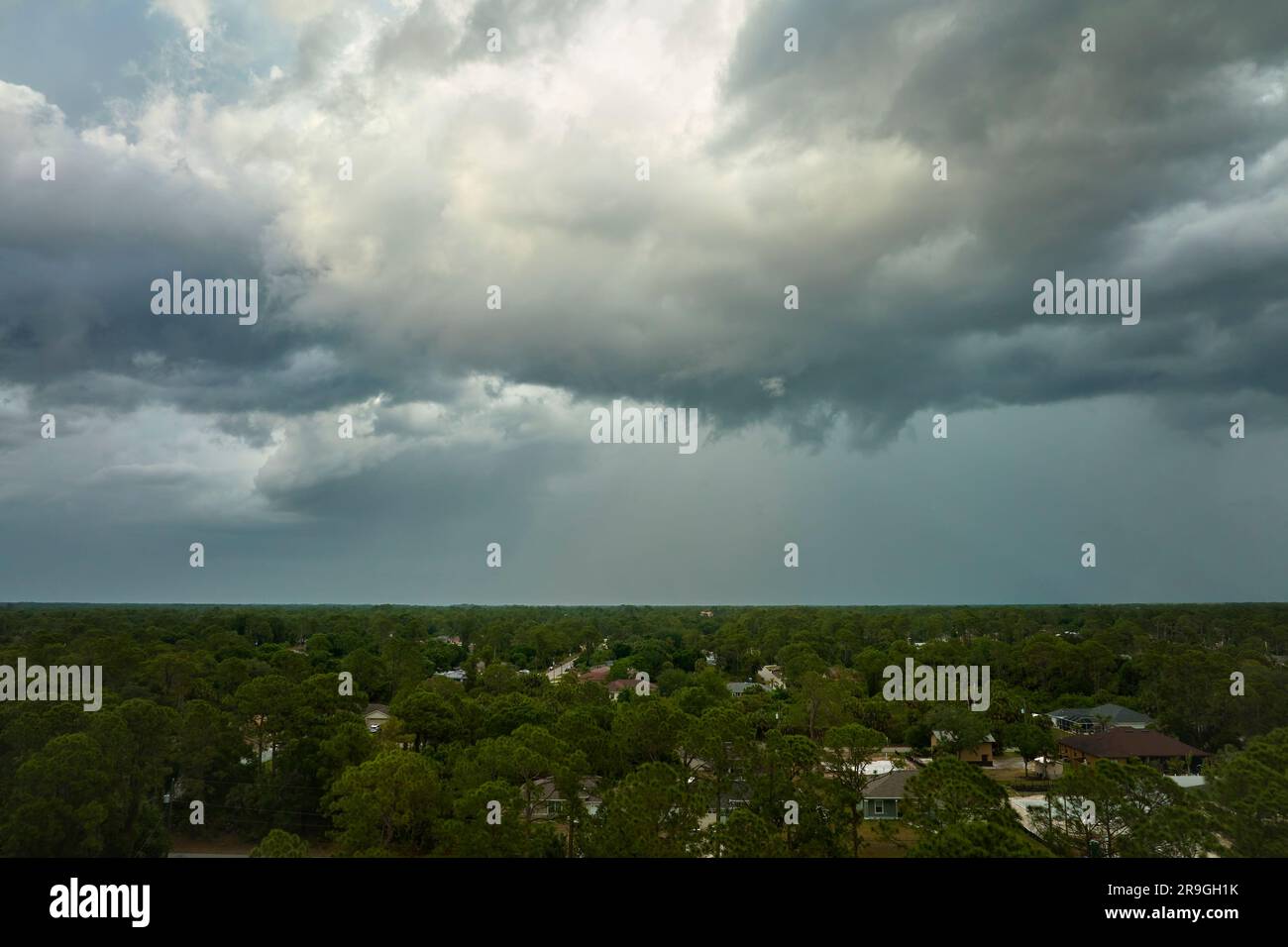 Landscape of dark ominous clouds forming on stormy sky before heavy ...