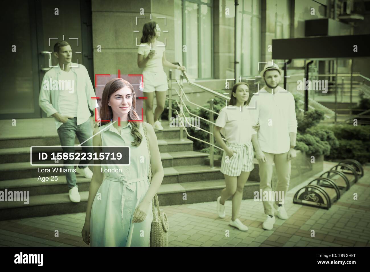 Facial recognition system identifying people on city street. Woman and ...