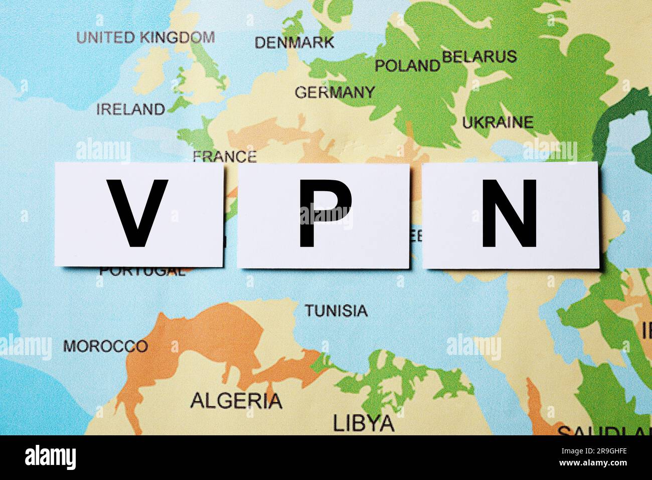 Paper notes with acronym VPN (Virtual Private Network) on world map ...