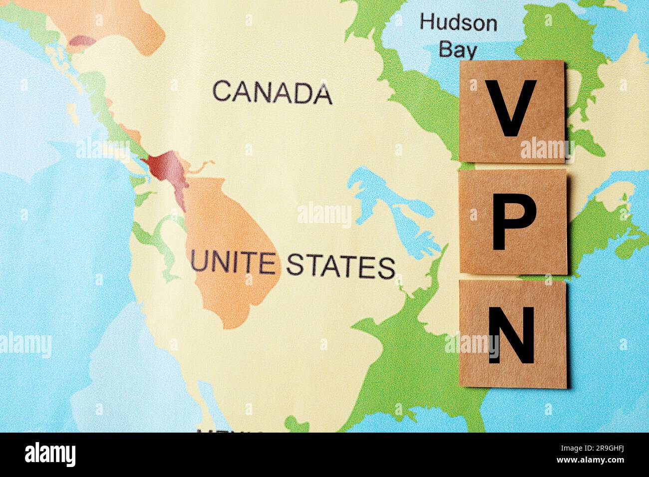 Paper notes with acronym VPN (Virtual Private Network) on world map ...